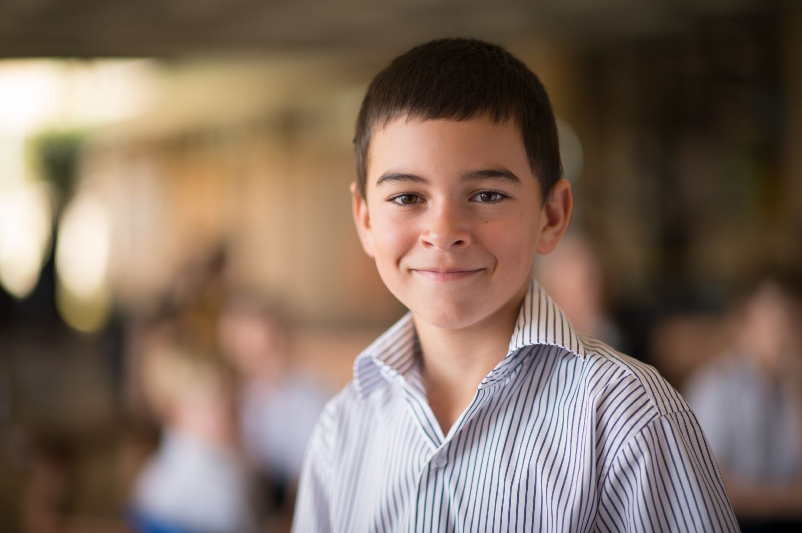 Portrait - cheeky looking boy - CCGS Christ Church Grammar School